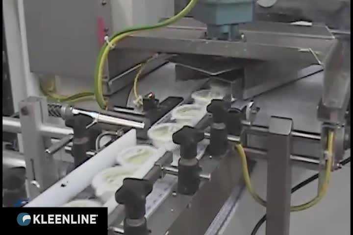 Singulating Chican Conveyor & Orienting Machine | Kleenline