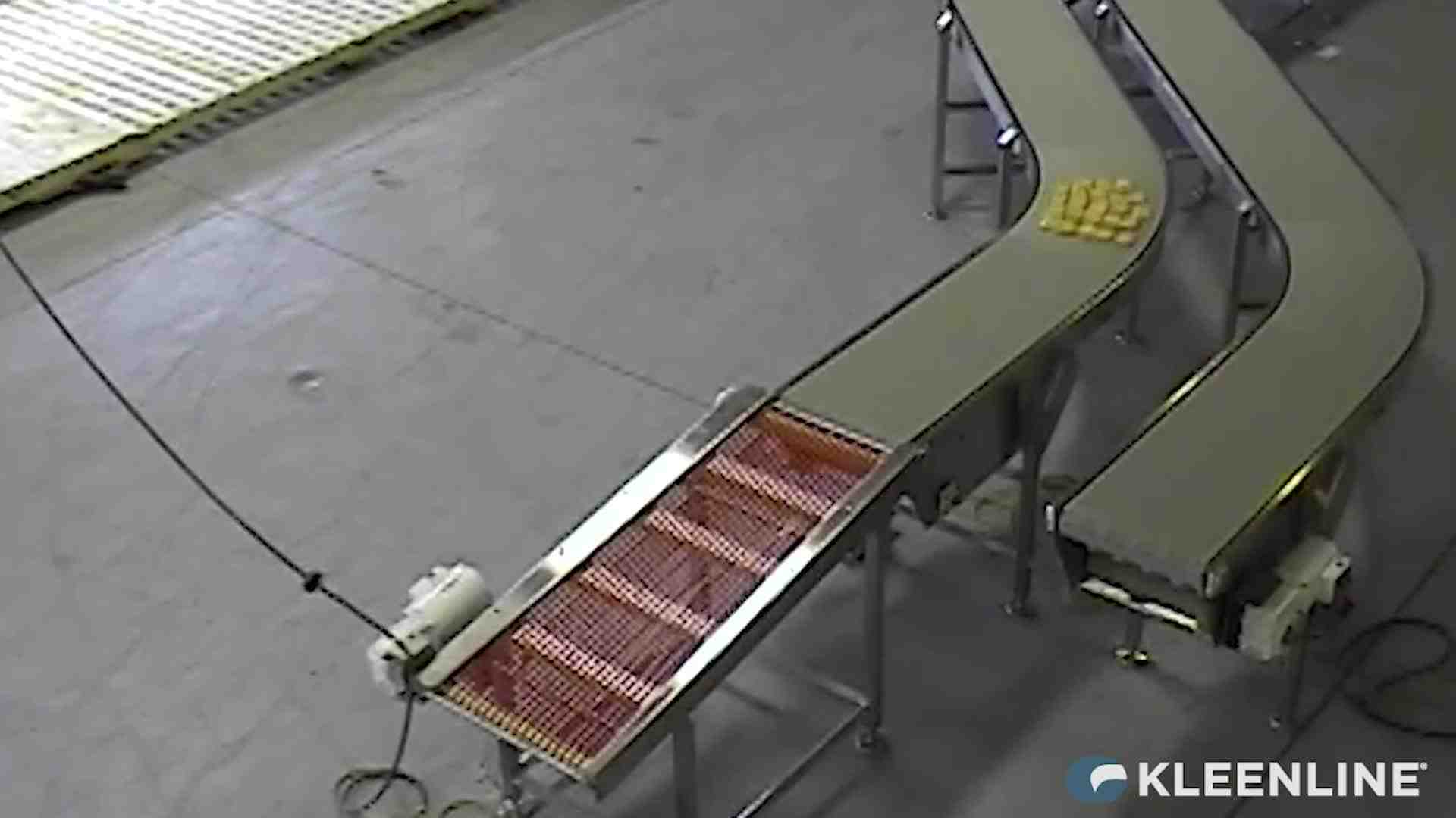 Product Spreader Conveyor - Positioning and Feeding | Kleenline